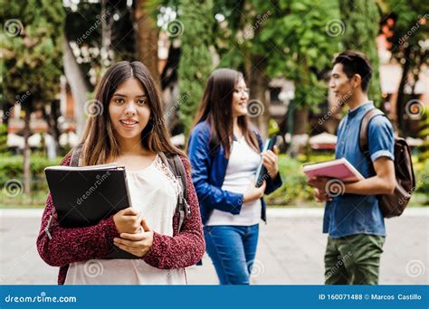 Latin Female Student Hispanic Girl In Mexico And Group Of Mexican