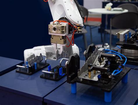 Robot Arm Loading Unloading Object Stock Photo Image Of Equipment Product