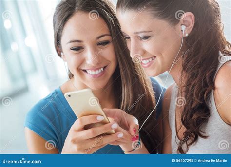 Girls Sharing Secrets In Classroom Royalty Free Stock Image 60176758