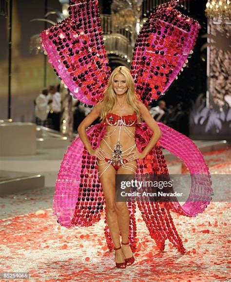 Heidi Klum Beach Photos And Premium High Res Pictures Getty Images
