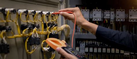 Electrician Engineer Work Tester Measuring Voltage And Current Of Power
