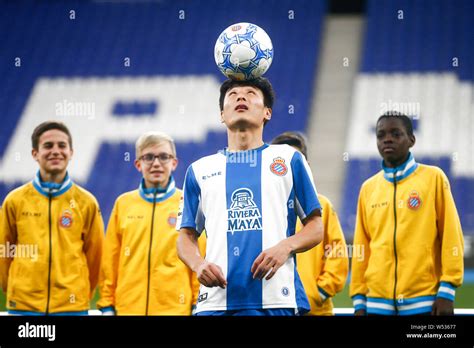 Chinese Football Player Wu Lei Controls The Ball During His Official