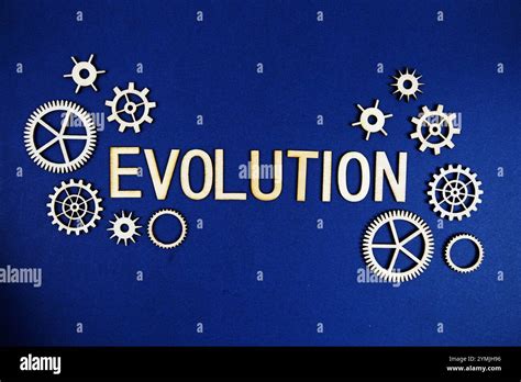 Evolution Alphabet Letters With Gears Element On Navy Blue Background