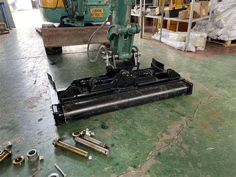 customizable grading beam for specific excavator requirements excavator