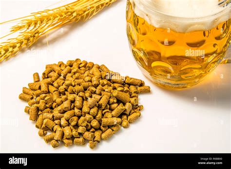 Hops Pellets With Beer Glass Stock Photo Alamy