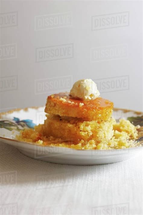 Cornbread Rounds With Honey Butter On A Plate Royalty Free Stock