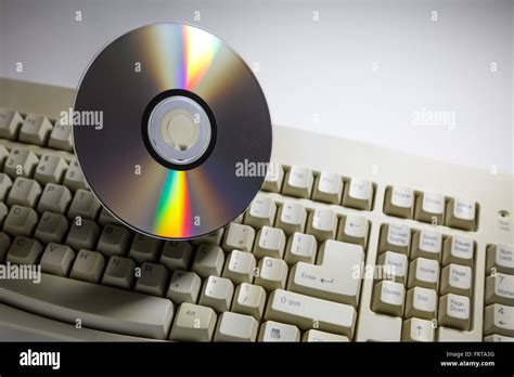 Computer Keyboard And DVD Disk Technology Concept Stock Photo Alamy