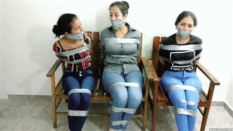 Mom and daughters tied up together | Scrolller