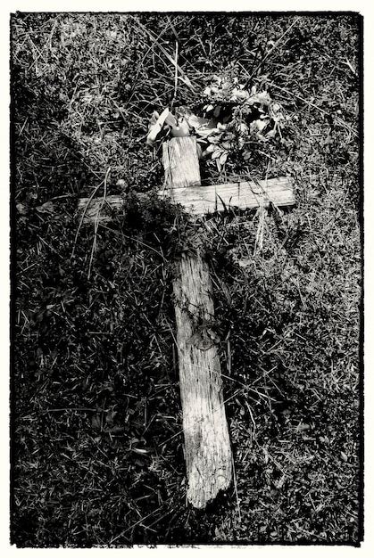 Premium Photo High Angle View Of Cross On Grassy Field