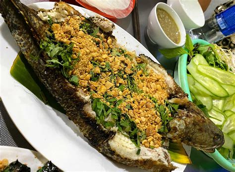 Grilled Snakehead Fish What And Where To Eat In Ca Mau Scooter Saigon Tours