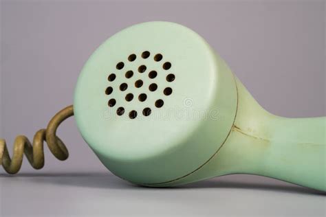 Tube From An Old Rotary Landline Phone Macro Shot Of A Green Plastic Telephone Receiver With