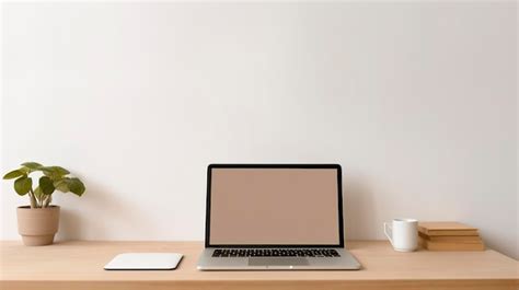A Photo Of A Minimalistic Computer Setup With A Laptop Monitor Premium AI Generated Image