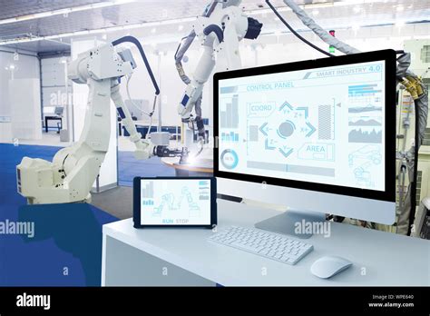 Computer And Digital Tablet For Control Of Robots In A Smart Factory Smart Industry 40 Concept