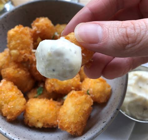 Patio Lit Eats Cod Fish Empanadas And Truffle Tater Tots Burgers