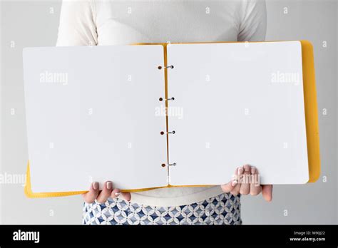 Female Holding Opened Paper Folder Stock Photo Alamy