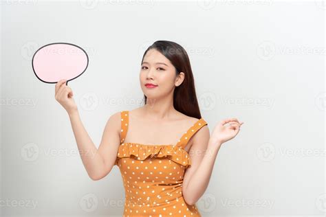 woman wearing vintage costume holding empty dialog box 11139265 stock