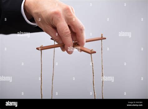 Puppet Strings Hand High Resolution Stock Photography And Images Alamy