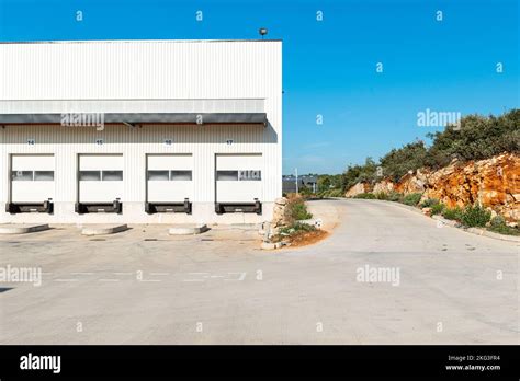 Facade Shot Of Newly Constructed Logistic Warehouse Featuring Empty