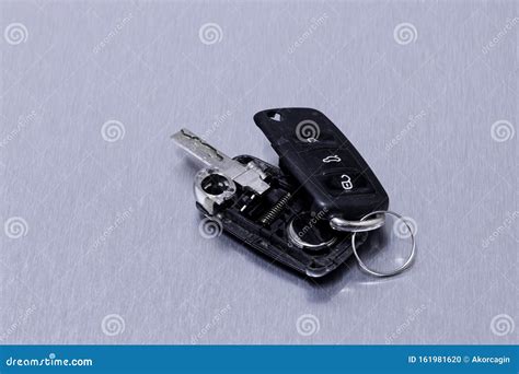 Broken Or Damaged Car Key Fob On Aluminium Background Repair Of Broken Or Damaged Remote Key