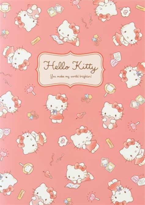 An Open Hello Kitty Notebook With Lots Of Cartoon Characters On The