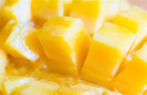 Premium Photo Close Up View Of Ripe Mango Fruit Sliced Into Cubes