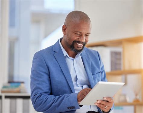 Premium Photo Smile Tablet And Search With Black Man In Office For Digital Communication And