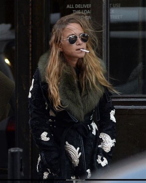 Kate And Ashley Olsen Pack On The Layers To Share A Smoke Artofit