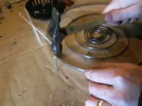 An easy way to fix a pull start recoil spring . | Doovi