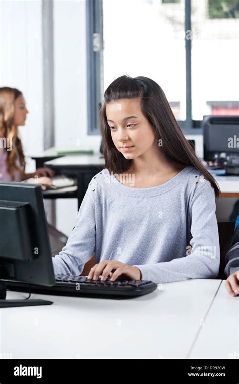 Girl Using Desktop Pc At Computer Lab Stock Photo Alamy