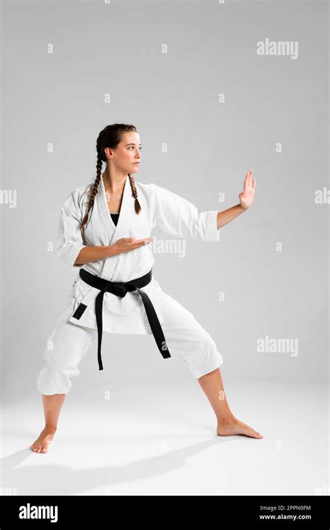 Full Length Shot Woman With Black Belt Kimono Practicing Karate Stock