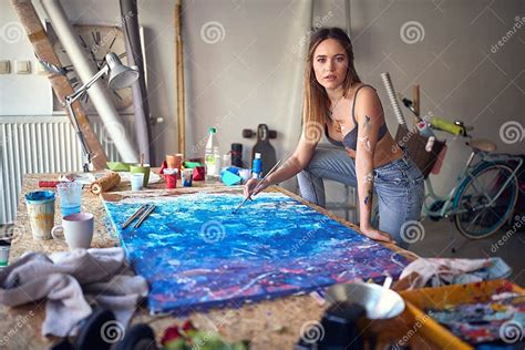 Woman In Topless Drawing On A Camvas In Art Studiocreative Inspired