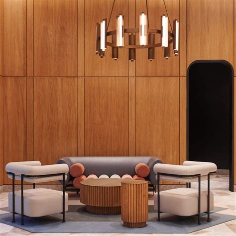 Steam Bent Timber Tunnels Through Sculptform Showroom By Woods Bagot