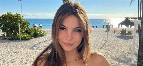 Grace Boor Squeezes Her Colossal Chest In A Tight Red Swimsuit