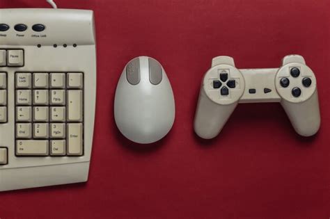 Premium Photo Retro Entertainment Old Fashioned Pc Mouse Keyboard Gamepad On Red
