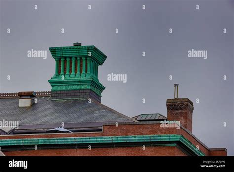 Architecture Design Of This Roof Top Building Where The Chimney Is