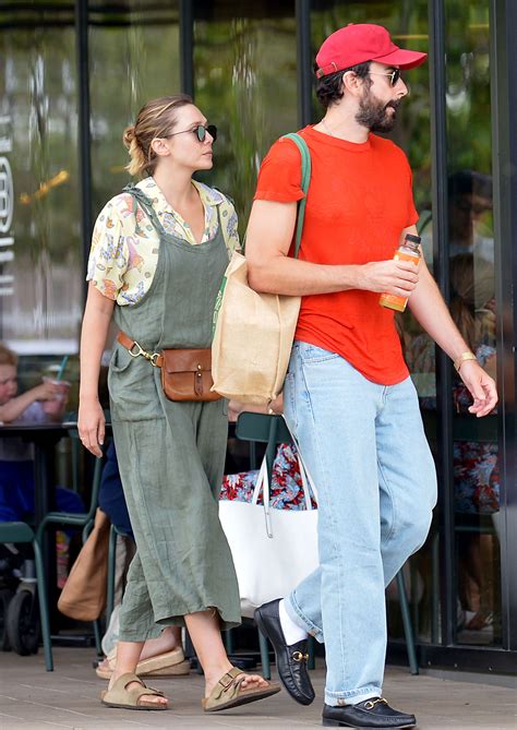 Elizabeth Olsen Robbie Arnetts Relationship Timeline Us Weekly