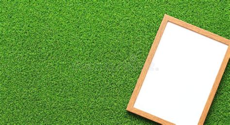 Empty Frame For Photo Or Text With A White Sheet On A Background Of Green Grass Stock Image