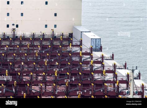 high angle view of the cargo hold of a large container ship with empty