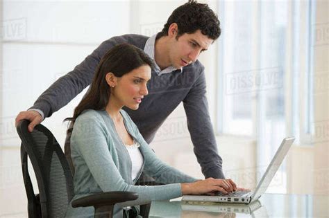 Business Man And Woman Using Computer In Office Royalty Free Stock Photo Dissolve