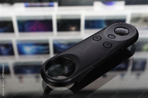 Wireless Shutter Release Of The Mirorless Camera Is Put On The Glass