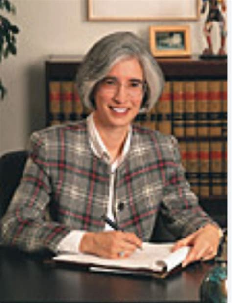 Roberta Robin Bren On Linkedin Going Back In Time A Seated Relaxed Smiling Pose With Pen And