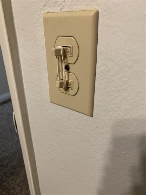 Bottom light switch is loose and won't turn off, but the top switch ...
