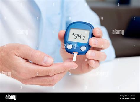 Man Measures His Blood Sugar Glucometer Blood Sample Test Diabetes