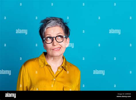 Photo Of Doubtful Attractive Lady Dressed Shirt Glasses Looking Emtpy