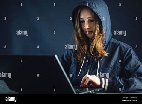 Girl Hacker Uses A Laptop To Hack The System Stealing Personal Data