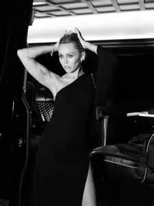 Miley Cyrus Turns Heads In A Daring One Shoulder Lbd With A Leg Slit