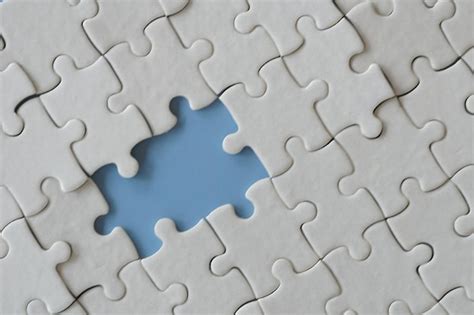 Premium Photo Jigsaw Puzzle Pieces On Blue Background