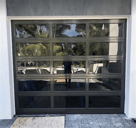 4 Ways Glass Garage Door Installation Will Enhance Your Summer