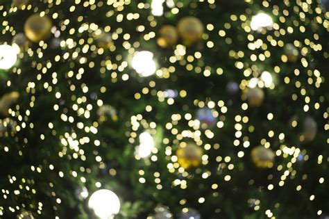 배경 빛 밤 Bokeh 추상 배경 반짝이 빈티지 조명 배경 Defocused 골드 Bokeh 크리스마스 배경을 추상화 합니다 렌즈 플레어 반사 아름 다운 반짝이 원형 0명에