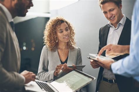 Its A Group Brainstorming Session A Group Of Businesspeople Using
